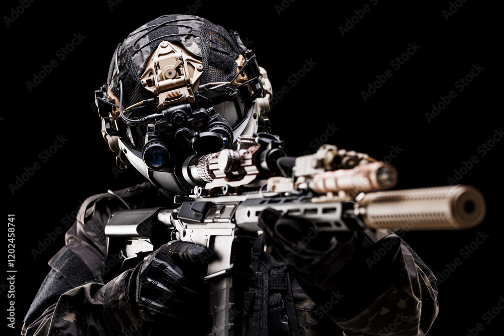 Special forces soldier aiming a rifle in tactical gear with advanced ...