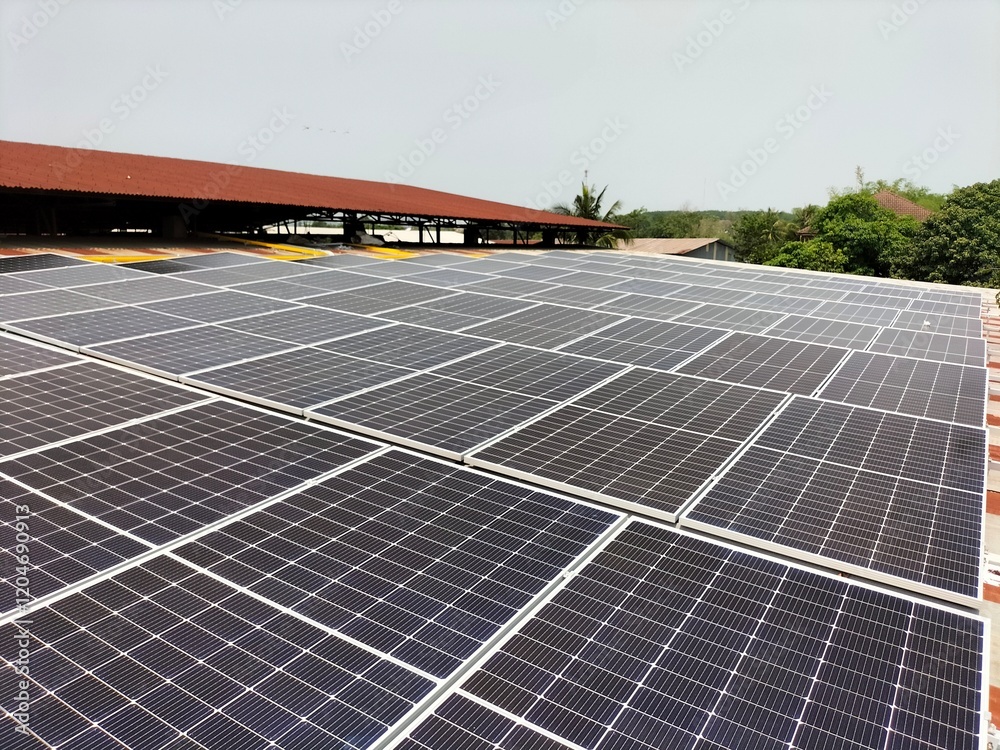 Installing solar panels on the roof to use as alternative energy for ...