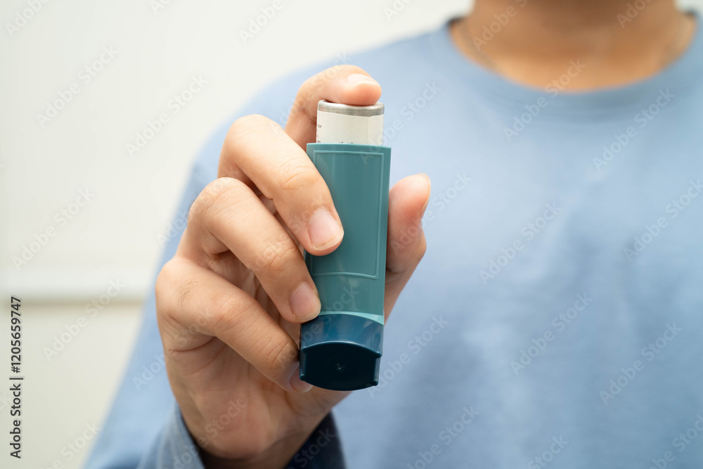 Asthma and chronic obstructive pulmonary disease COPD, Asian young man ...