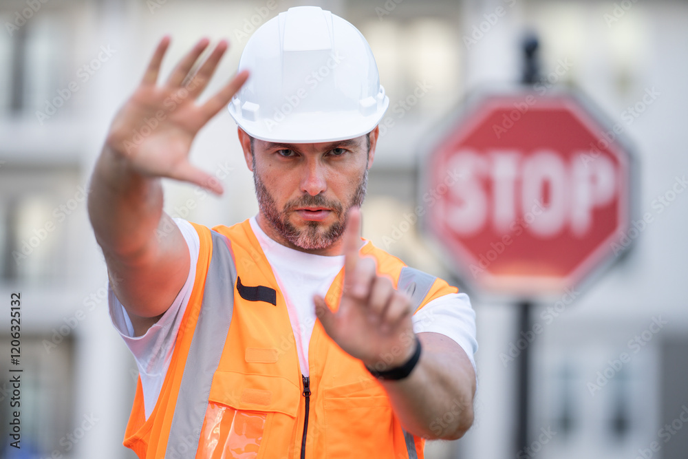 Zdjęcie bez tantiem: Construction worker with stop sign. stop sign or ...