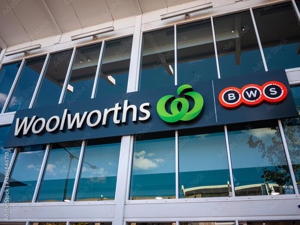 Sign of Woolworths supermarket and BWS on a building in Melbourne ...
