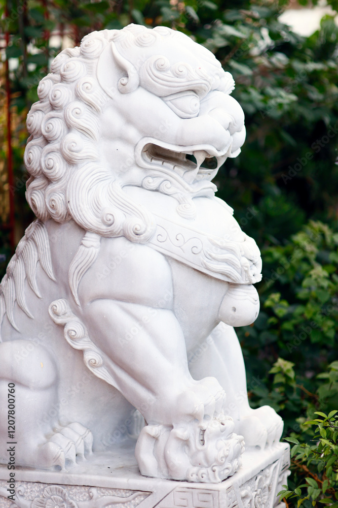 Temple Guardian statue of Chinese lion representing Yin force, female ...