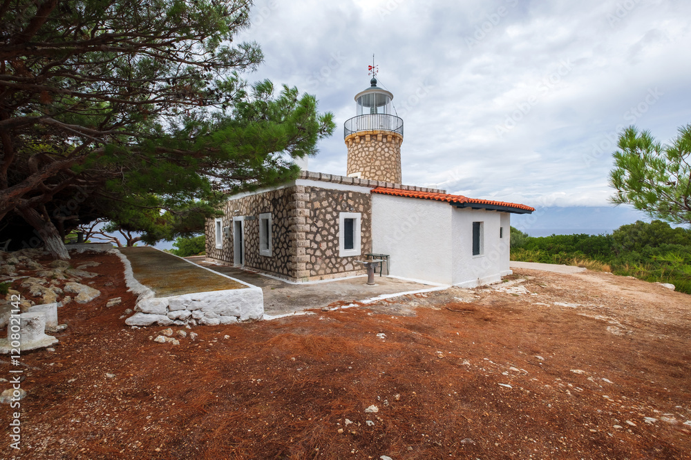 The famous Skinari Lighthouse on the island of Zakynthos is a popular ...