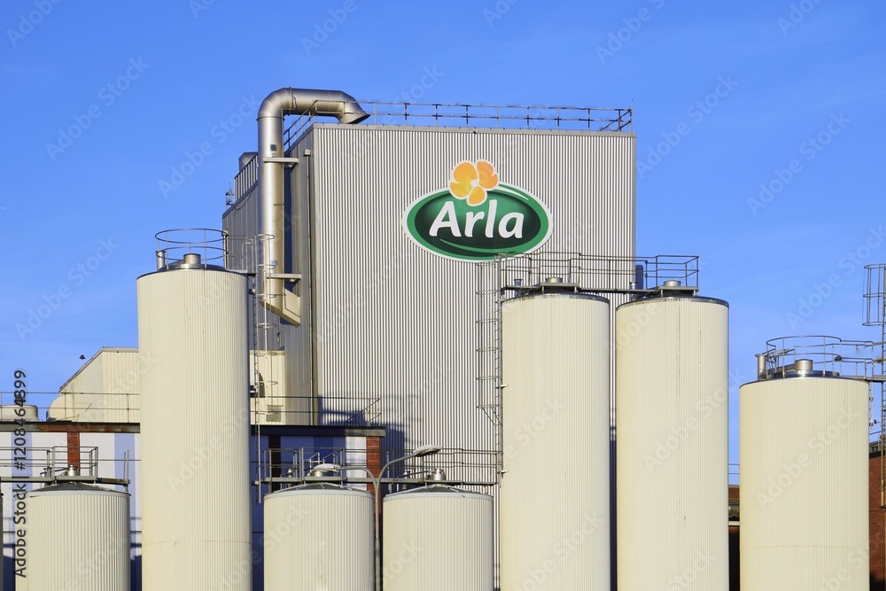 Sweden. Towers, storage facility of the modern Arla dairy plant.Foods ...