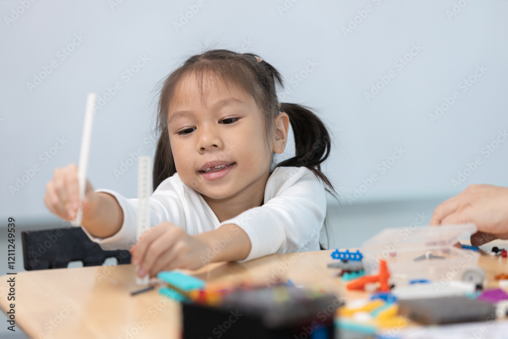 Education STEM children student classroom in school. Robot assembly training, brain development ...