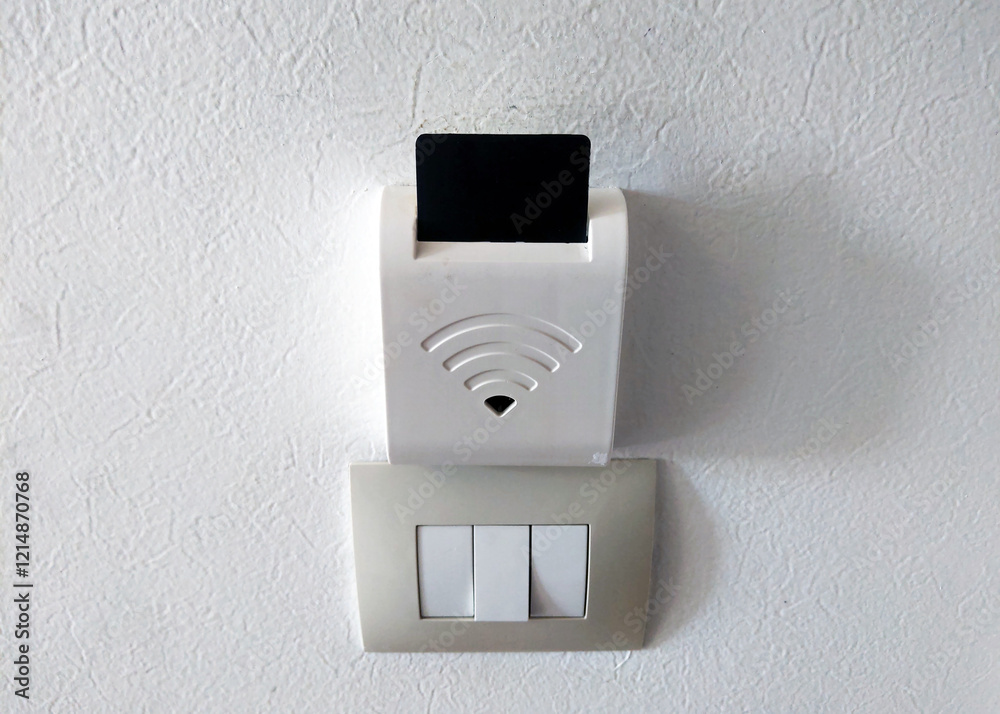 Smart Card Reader and Light Switch on Textured Wall for Modern Access ...