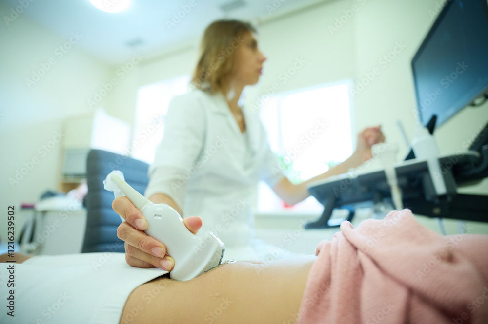 Pediatric ultrasound scan. Child ultrasound. Pediatrician scanning ...