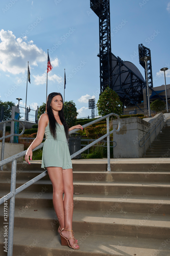 Sexy petite brunette woman wearing a teal or mint colored short ...