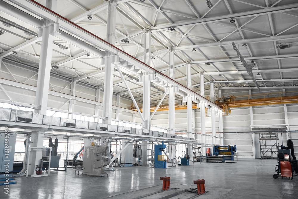 Yellow overhead traveling gantry crane beam on the pillars and truss ...