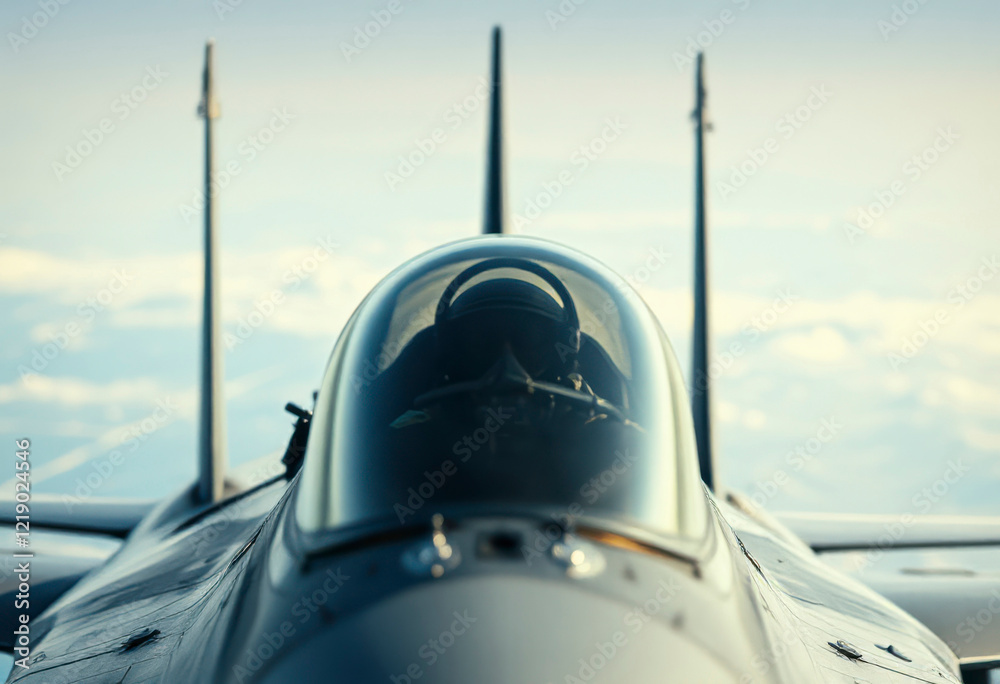 Pilot focused and alert inside a military fighter jet cockpit while ...