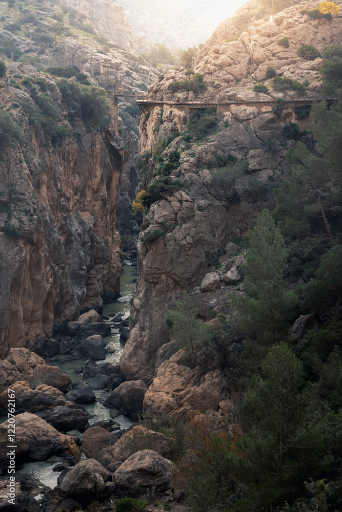 Equipped tourist trail along steep edge of cliff above narrow mountain ...