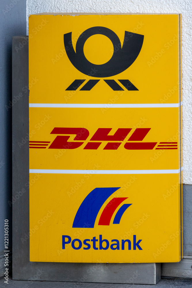 Menden NRW, Germany – January 21, 2025: Wall sign with logos of Post ...