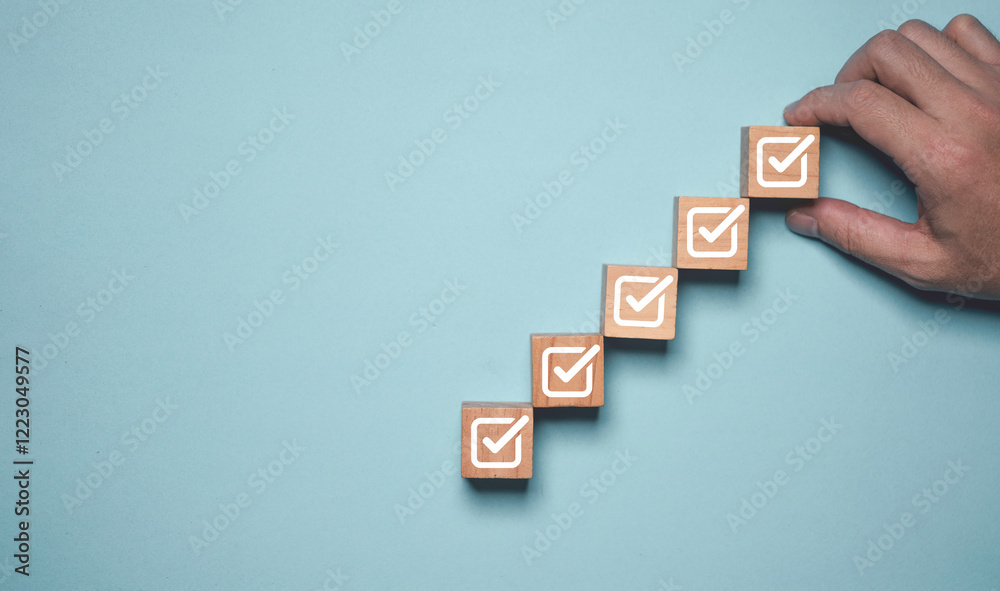 Hand holding correct or tick sign mark for quality document control ...