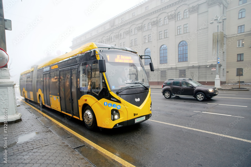 Stock-Foto „Minsk, Belarus. Jan 7, 2025. Yellow electric bus Vitovt Max ...