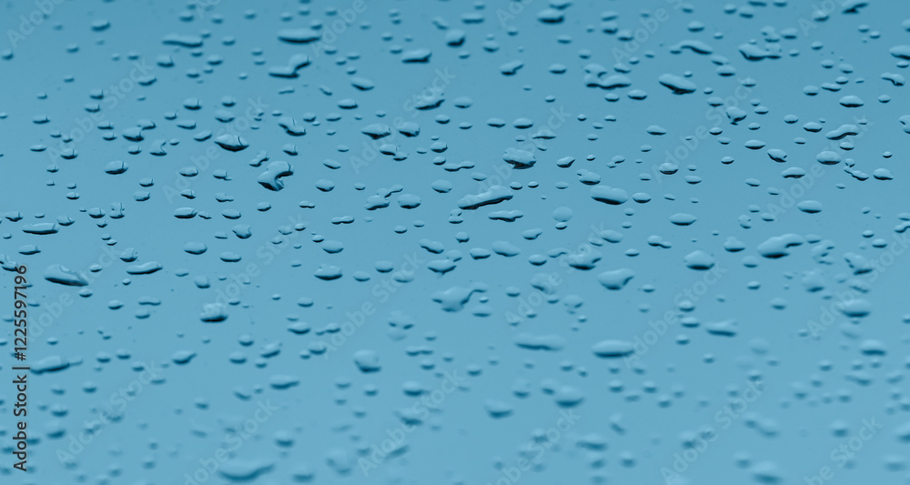 Sky blue background with raindrops pattern on glass. Banner with ...
