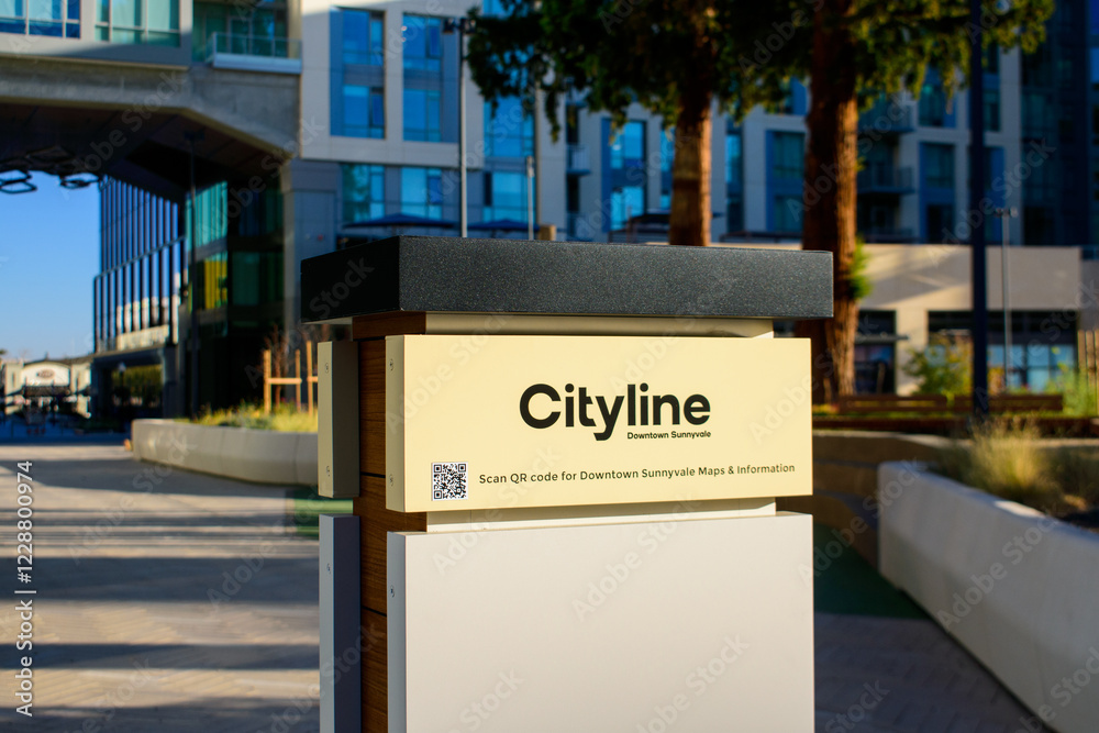Cityline Downtown Sunnyvale sign with a QR code set against an urban backdrop of contemporary ...