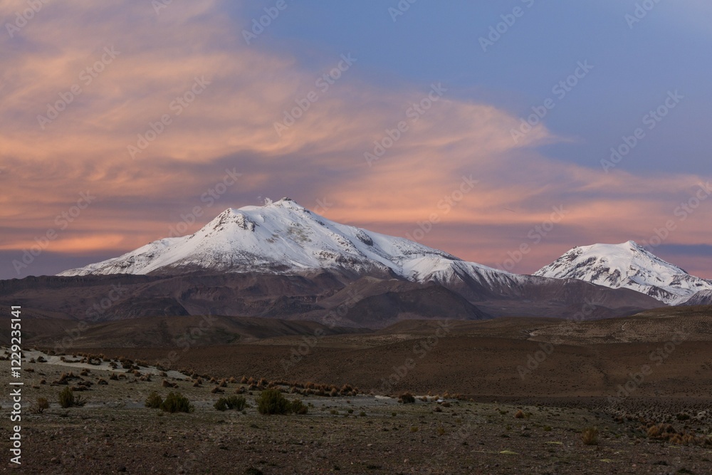 Volcano Parinacota with snow in the evening light, Putre, Region de ...