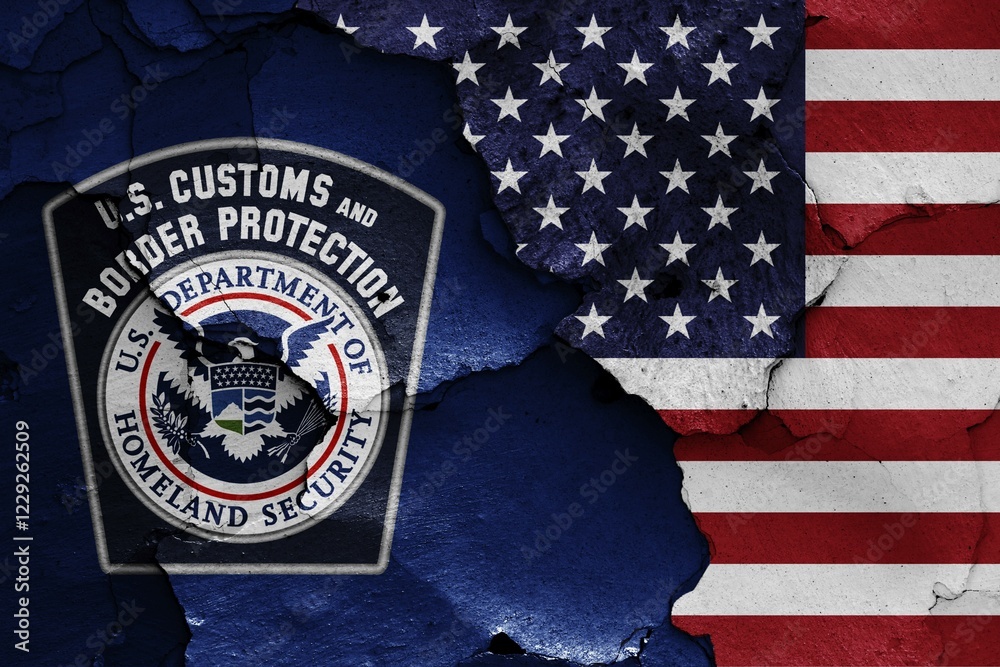 Flags of U.S. Customs and Border Protection and USA painted on cracked ...