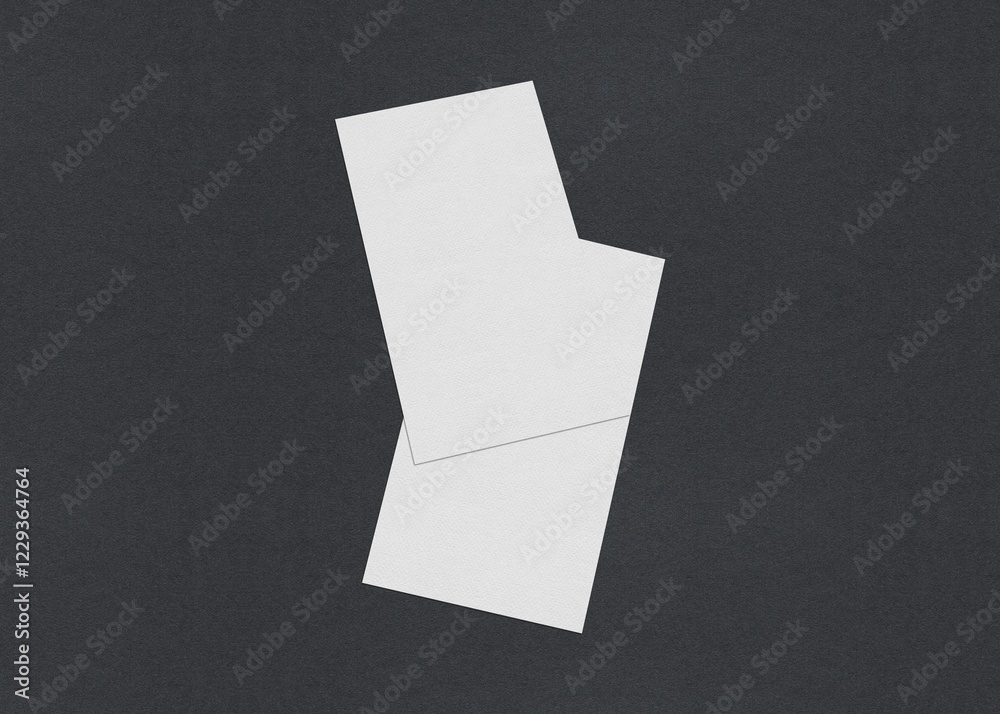 Two white rectangular sheets partially overlapping on a dark background ...