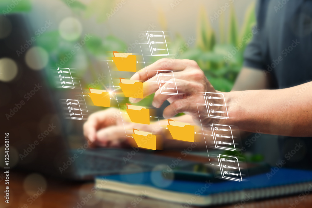 Man using laptop to access document information online through ...