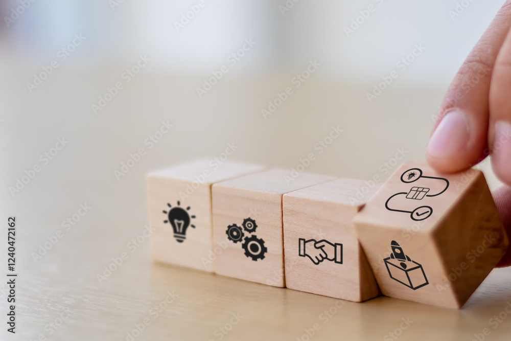 New product development and project roadmap concept. Wooden blocks with ...