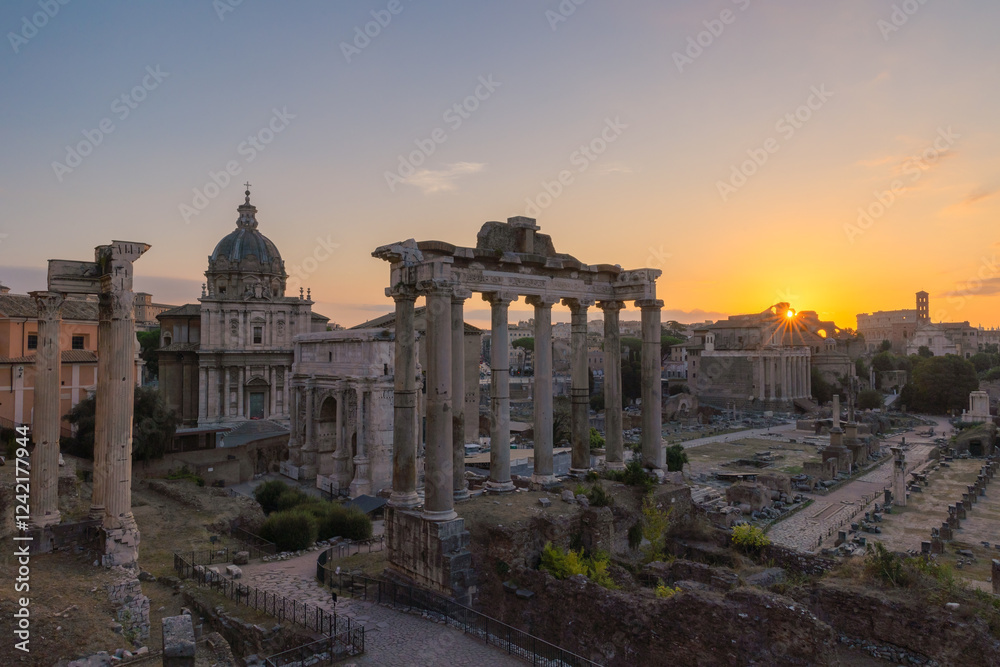 Sunrise over the Roman Forum and archaeological zone encompassing the ...