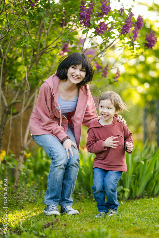 Cute big sister cuddling with her toddler brother. Adorable teenager ...
