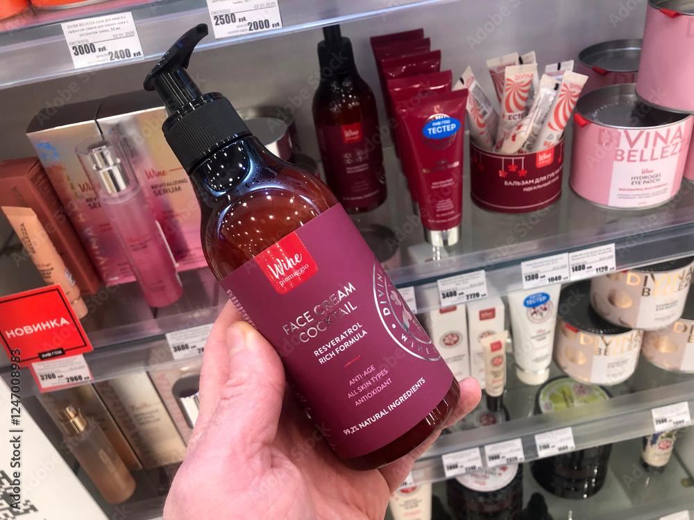 The customer holds the lotion. Store perfumery and cosmetics. Russia ...