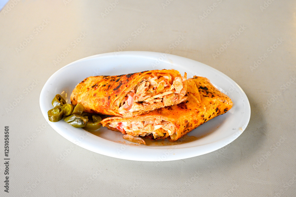 Lavash zurna doner kebab ( zurna durum ) or shawarma sliced in plate ...