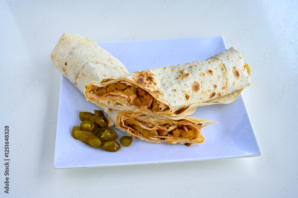 Lavash zurna doner kebab ( zurna durum ) or shawarma sliced in plate ...