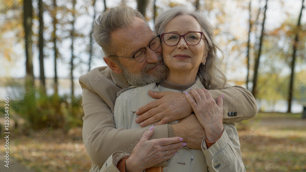 Retired mature old man hug woman from behind affectionate husband ...