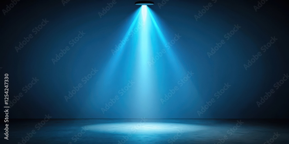 Darkened room with a single blue spotlight illuminating the space ...