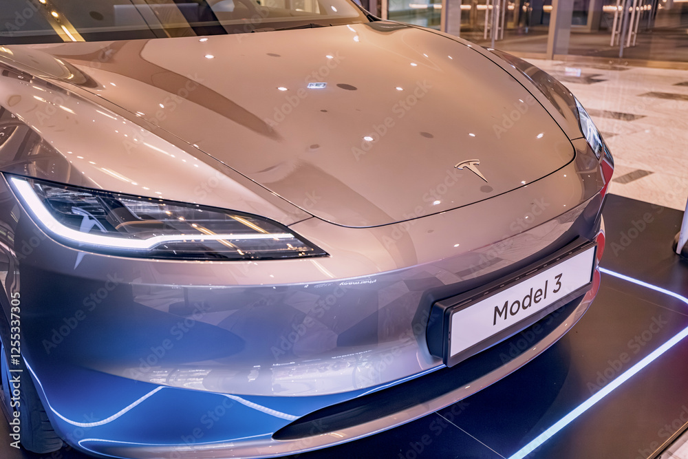 Foto de Stock 17 January 2025, Abu Dhabi, UAE: Modern gray Tesla Model ...