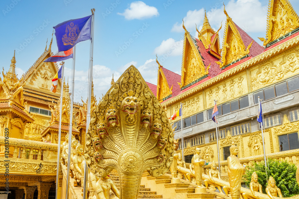 Wat Kean Kleang golden buddhist pagoda temple walls, stairs and Naga ...