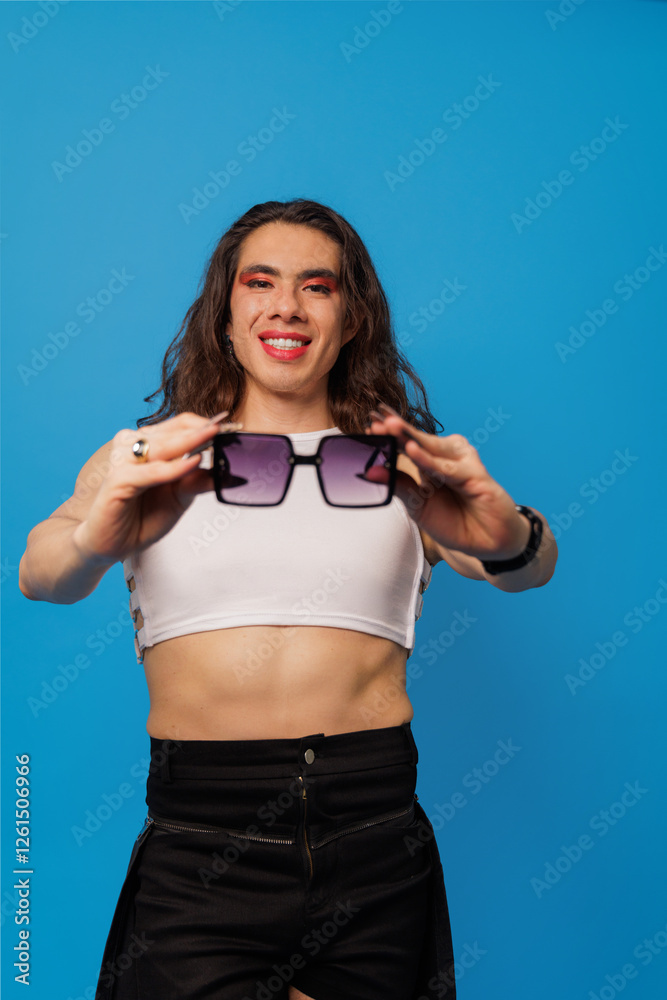 non-binary stylish person, trans men wearing glasses posing with happy ...