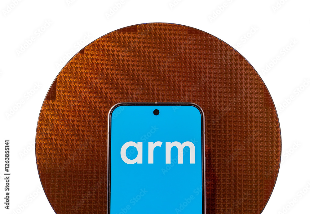 ARM Holdings logo seen on smartphone and the semiconductor wafer with ...
