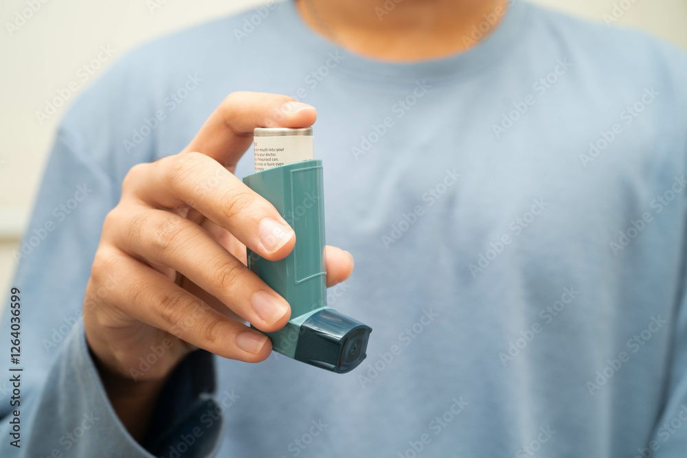 Asthma and chronic obstructive pulmonary disease COPD, Asian young man ...