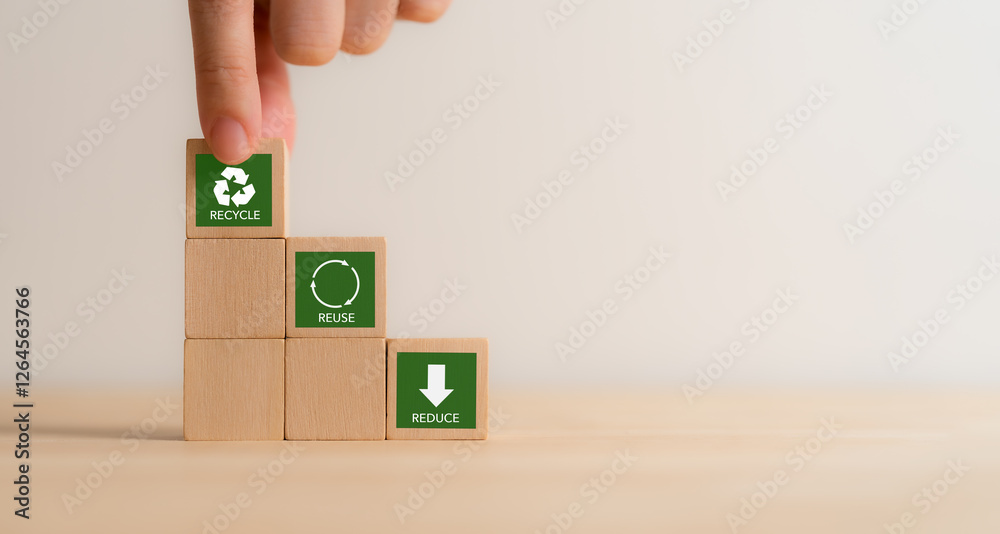 Stock-Foto „3Rs Concept. Reduce, Reuse, Recycle. Hand placing wooden ...