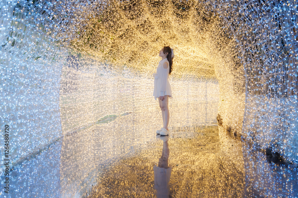 asian woman inside light trace tunnel at light show Nasatta Park ...