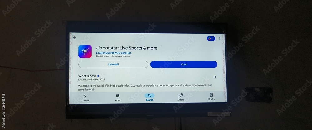 New Delhi, India - February 15 2025. Jio hotstar app icon on LCD tv ...
