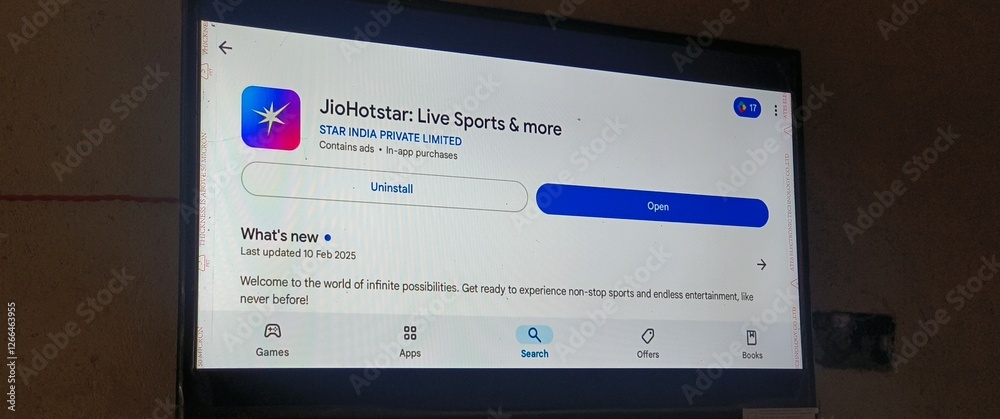 New Delhi, India - February 15 2025. Jio hotstar app icon on LCD tv ...