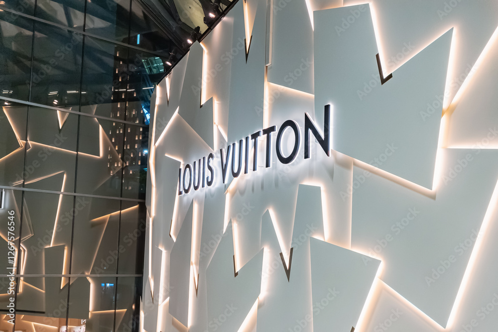 17 January 2025, Abu Dhabi, UAE: Large illuminated signage of a luxury ...