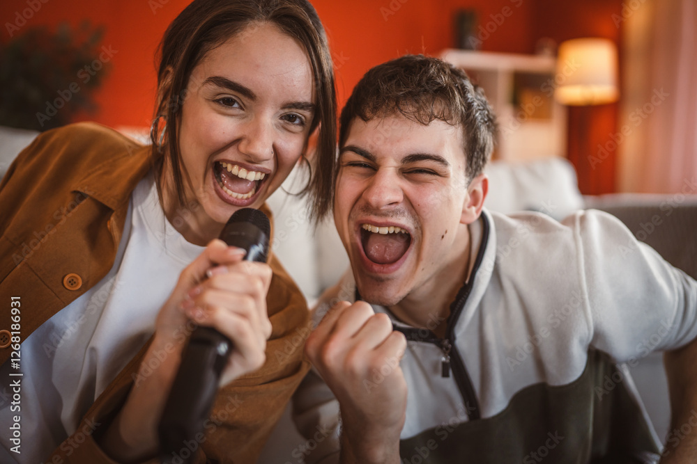 self portrait of young couple girlfriend and boyfriend sing karaoke ...