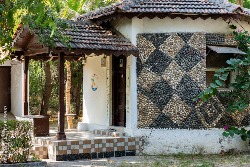 Traditional Indian Hut with Decorative Wall and Swing at Open Balcony ...
