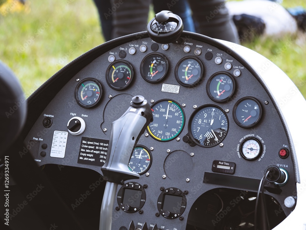 A detailed view of an ultralight aircraft cockpit showing various ...