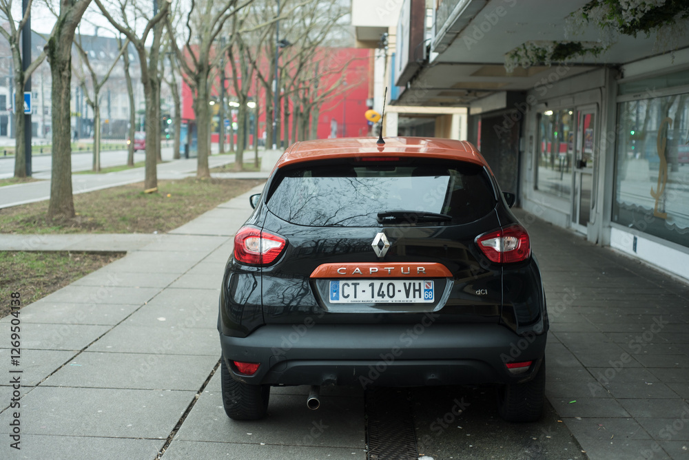 Mulhouse - France - 16 february 2025 - rear view of orange and black ...