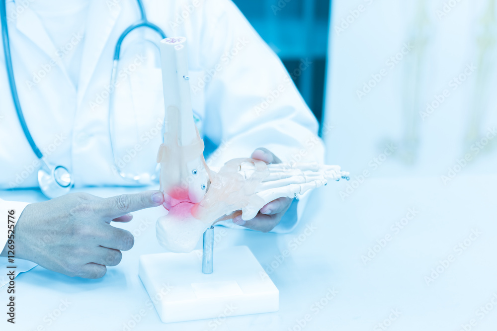 Orthopedist explain to the patient for human foot bone injury treatment ...