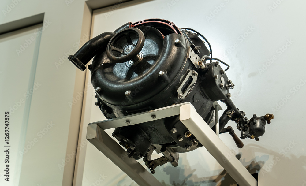 Turbocharger unit. The unit is an air pump used to increase the power ...