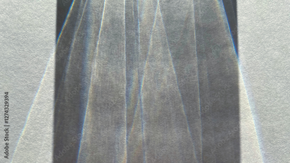 Sunlight casting on a white paper surface trough clear glass. Light ...