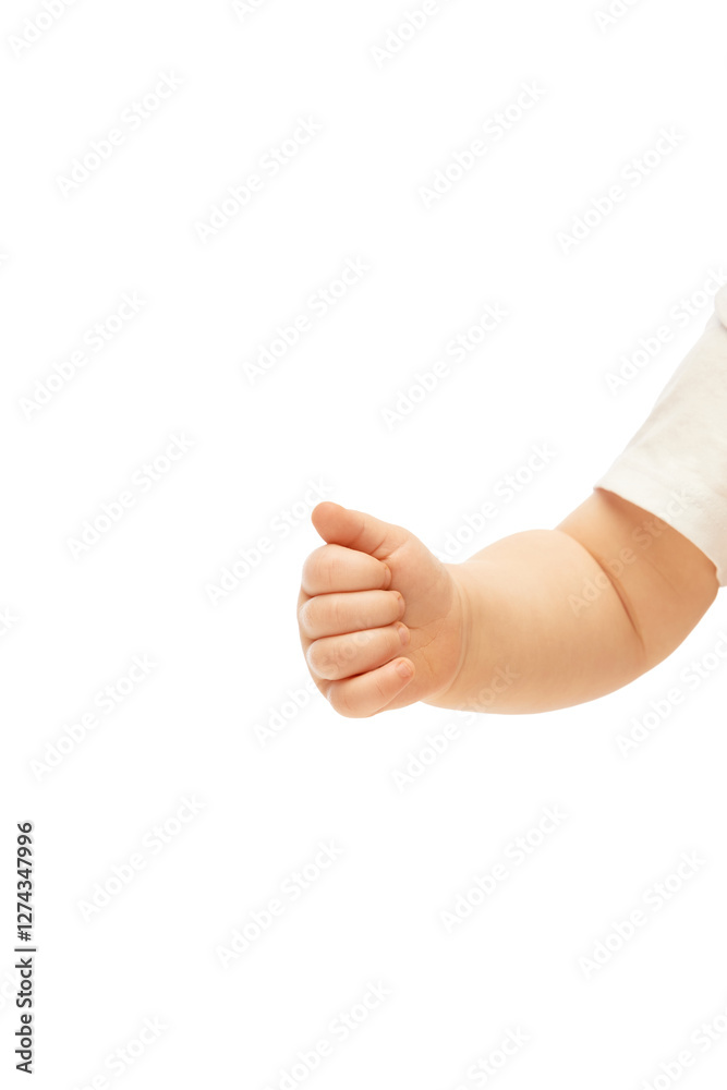 Chubby baby hand clenched into tiny fist stretching outward against ...